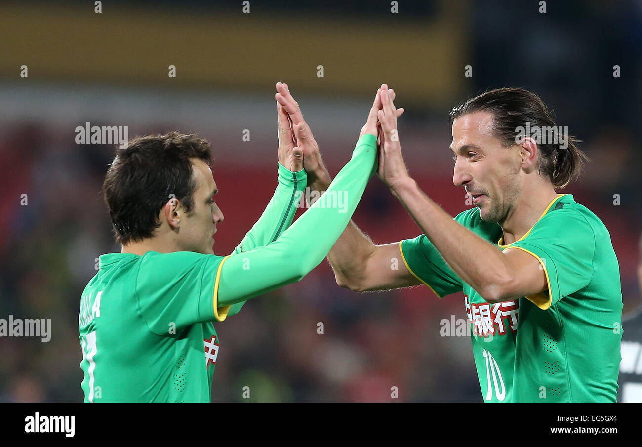 Beijing, China. 17th Feb, 2015. Dejan (R) of China's Beijing Guoan FC ...