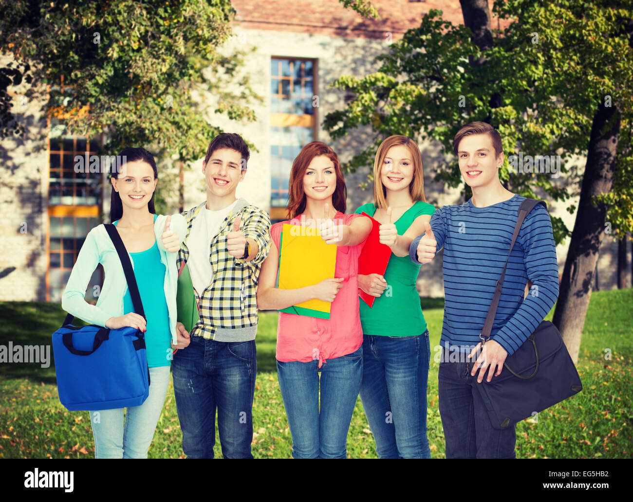 group of smiling students standing Stock Photo - Alamy
