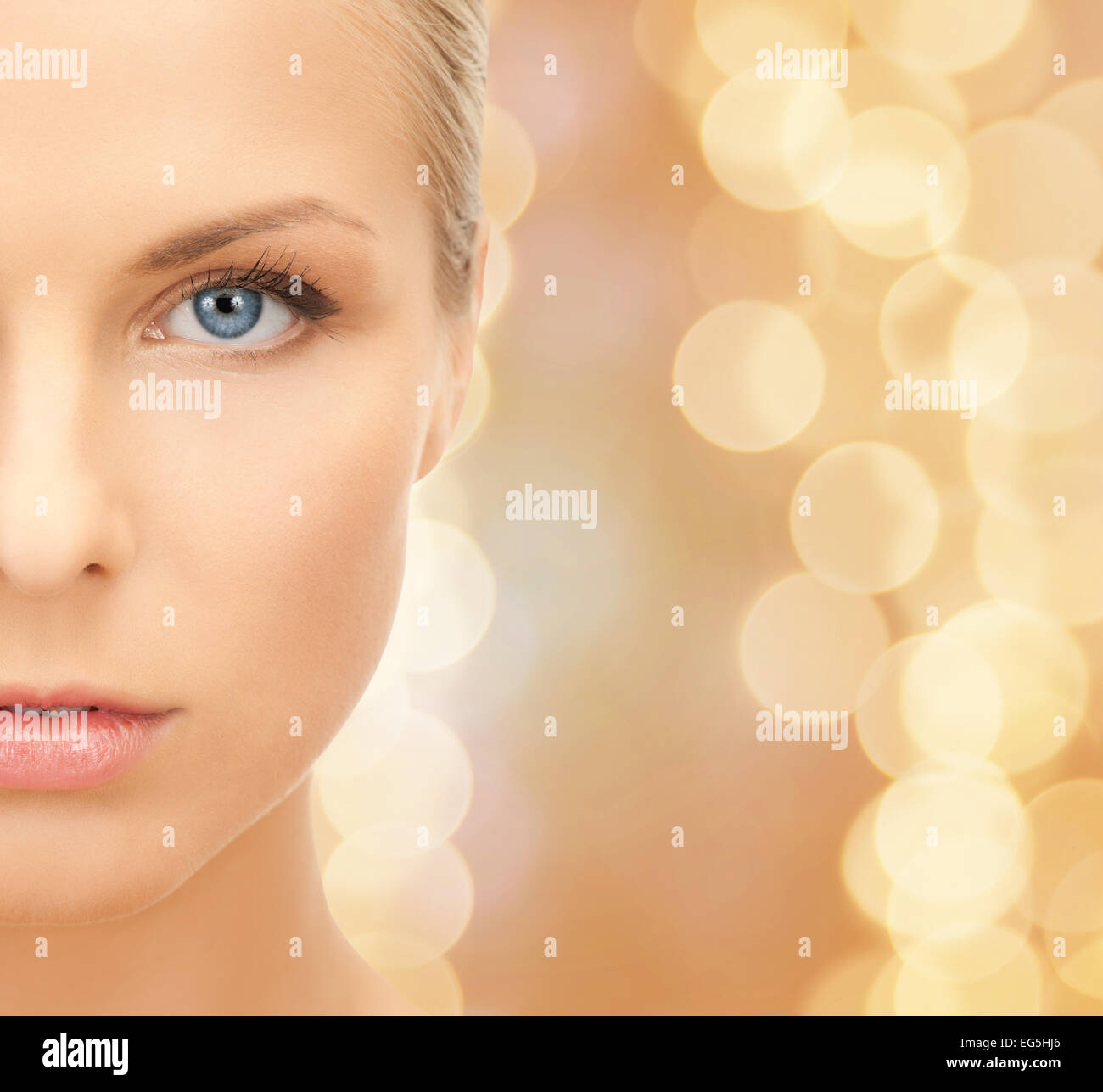 beautiful young woman half face Stock Photo - Alamy