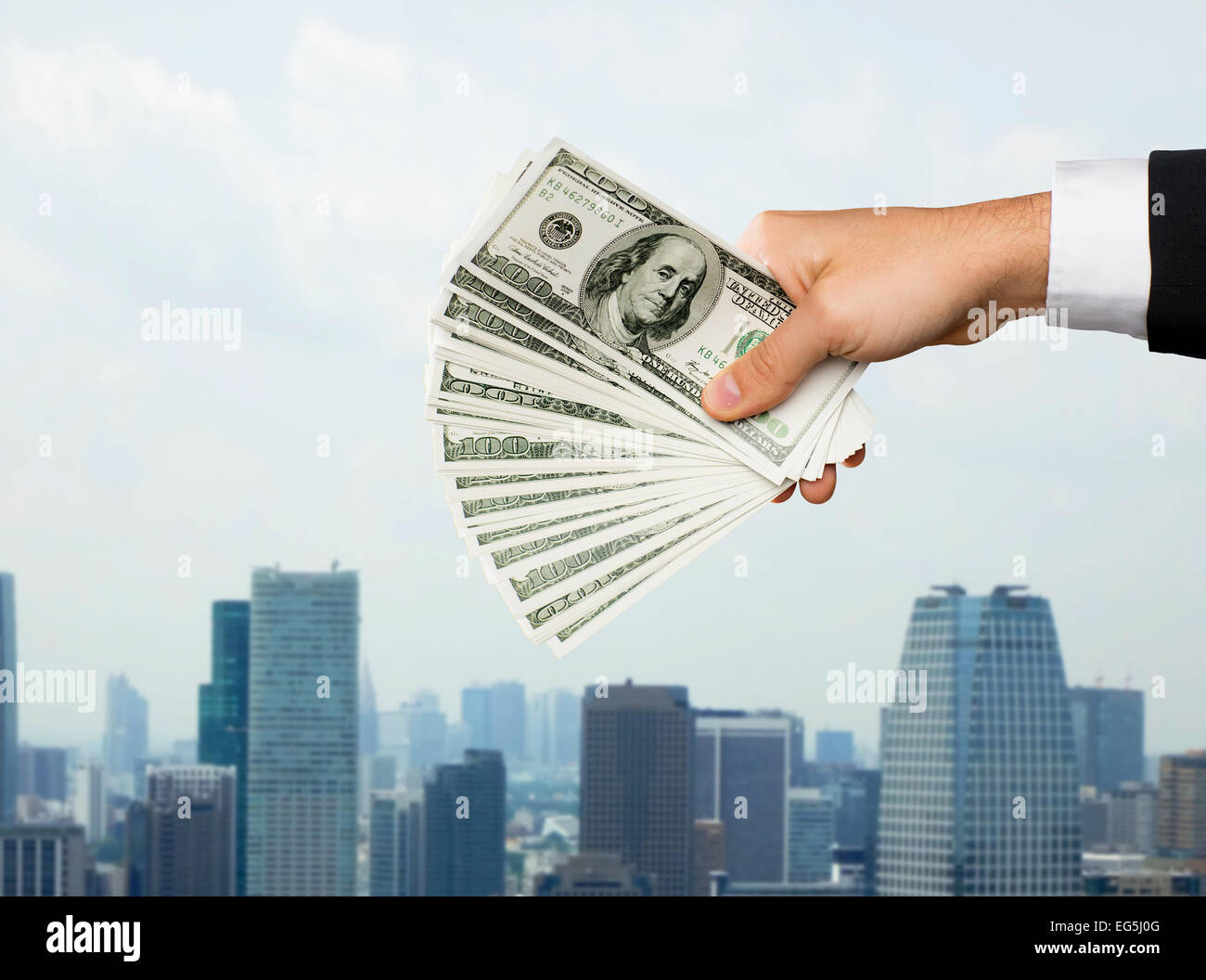 close up of male hand holding dollar cash money Stock Photo - Alamy