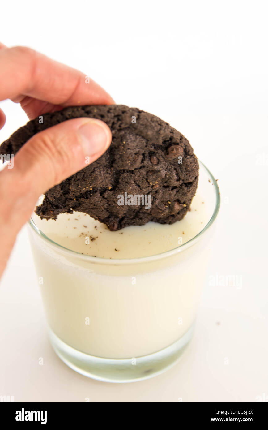 Cookie dunked glass milk hi-res stock photography and images - Alamy
