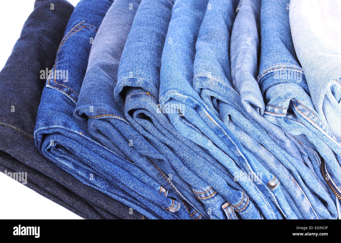 stack of different kind of blue jeans, on white background Stock Photo ...