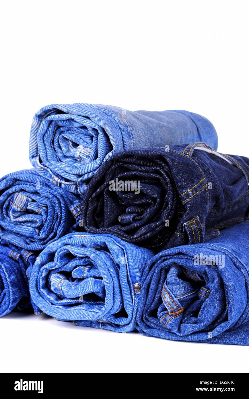 stack of different kind of blue jeans, on white background Stock Photo ...