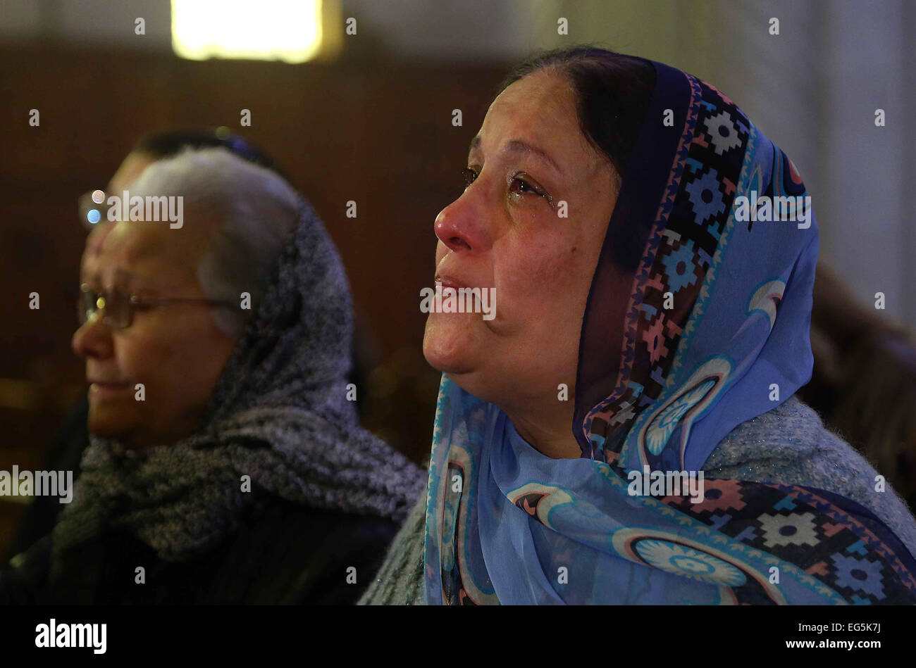 Cairo, Egypt. 17th Feb, 2015. An Egyptian Coptic woman attends a mass ...