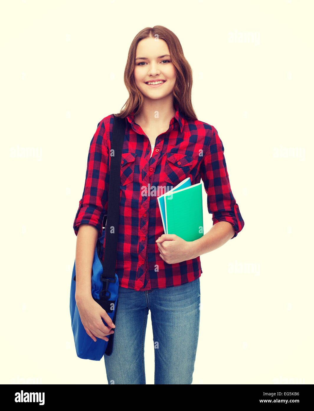 smiling female student with bag and notebooks Stock Photo - Alamy