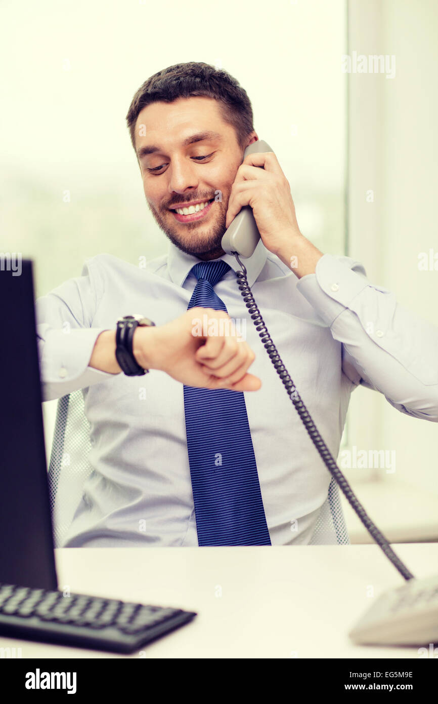 Employee making business call sitting hi-res stock photography and images - Alamy