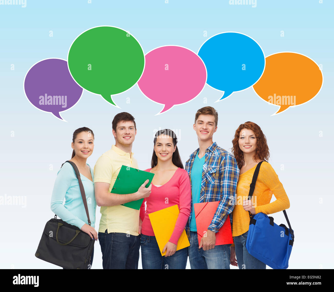 group of smiling students with text bubbles Stock Photo - Alamy