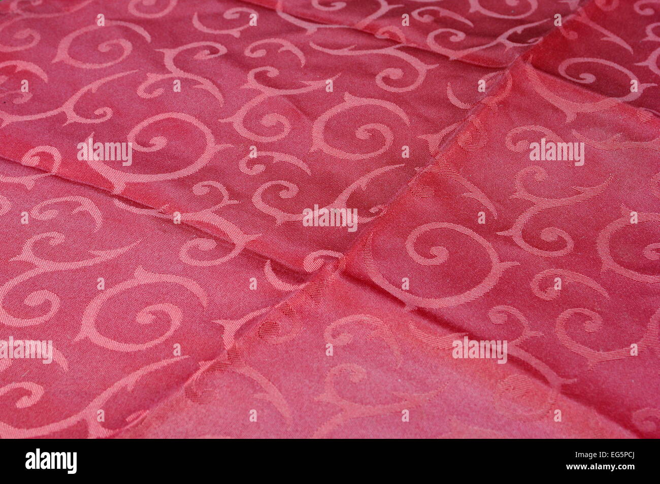 red napkin with original pattern as background Stock Photo - Alamy