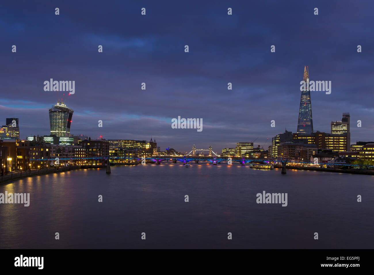 Stunning view of the River Thames and skyline at night in London ...
