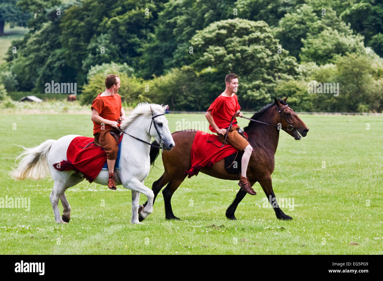 Living historians as Roman calvary exercising horses showing stirupless ...