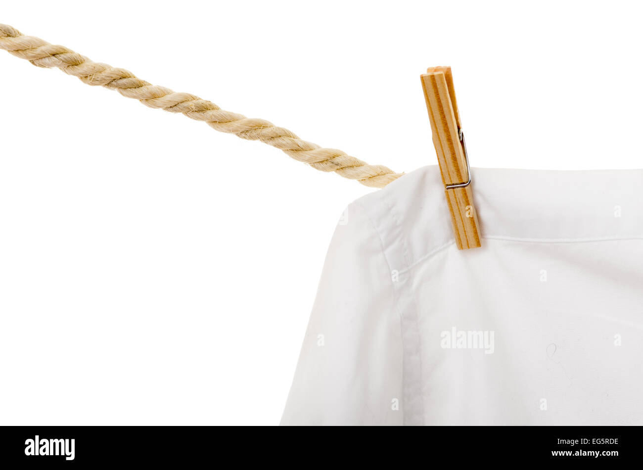 white shirt hanging on a rope clothesline Stock Photo - Alamy