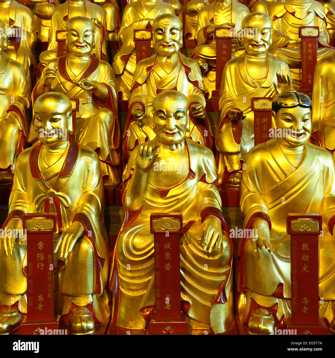 Gold statues of the Lohans in Longhua buddhist temple, Shanghai, China ...