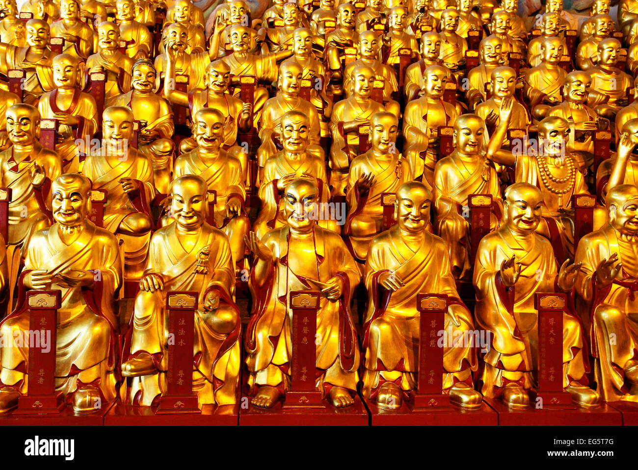 Gold statues of the Lohans in Longhua buddhist temple, Shanghai, China ...
