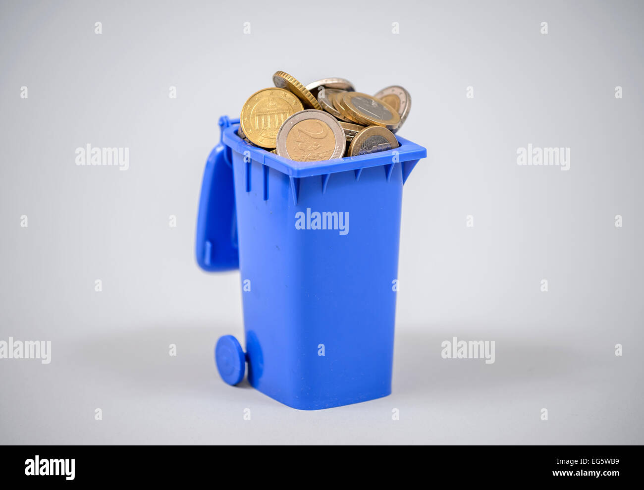 Dresden, Germany. 12th Feb, 2015. ILLUSTRATION: A blue garbage can ...