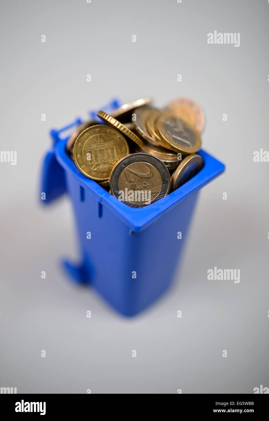 Dresden, Germany. 12th Feb, 2015. ILLUSTRATION: A blue garbage can ...