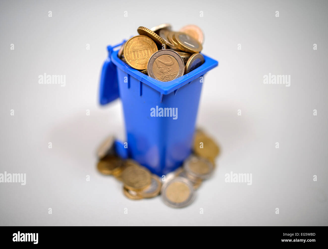 Dresden, Germany. 12th Feb, 2015. ILLUSTRATION: A blue garbage can ...