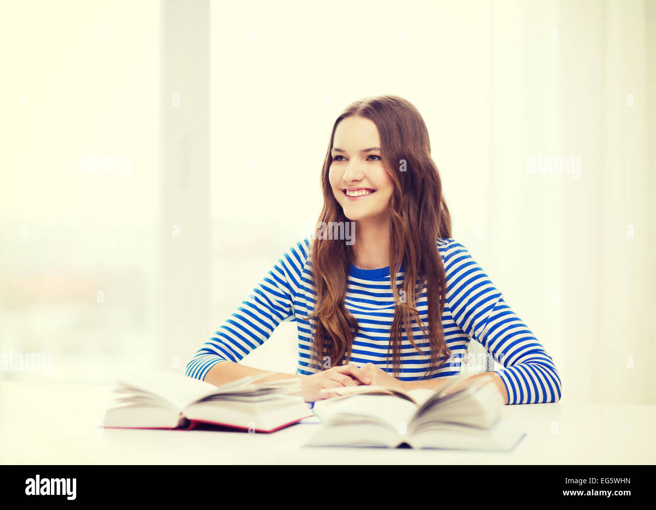 happy smiling student girl with books Stock Photo - Alamy
