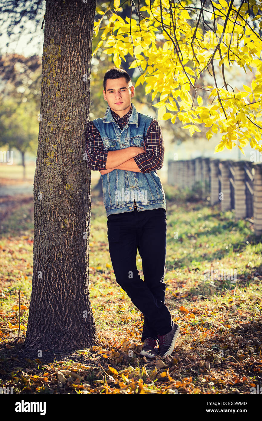 Caucasian guy stands in park hi-res stock photography and images - Alamy