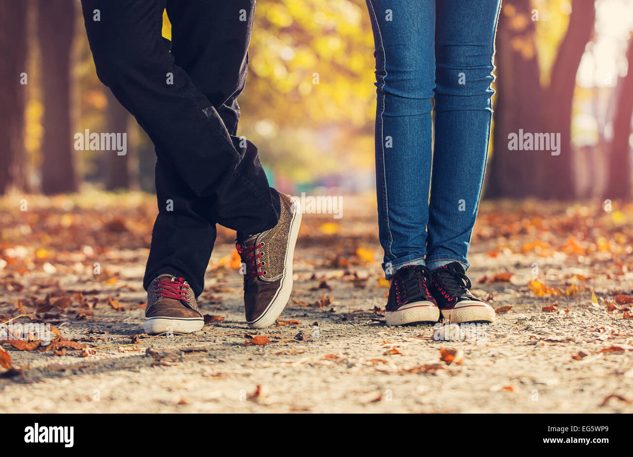 man woman leg couple love feelings Stock Photo - Alamy