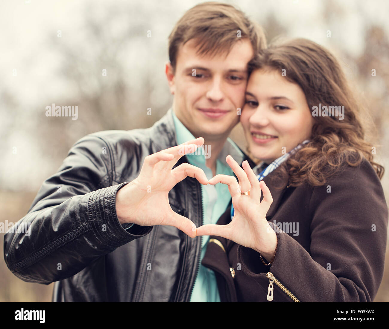 Couple hold hand show hi-res stock photography and images - Alamy