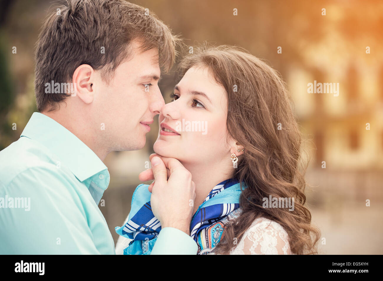 Romantic hug sunny portrait couple man woman Stock Photo - Alamy
