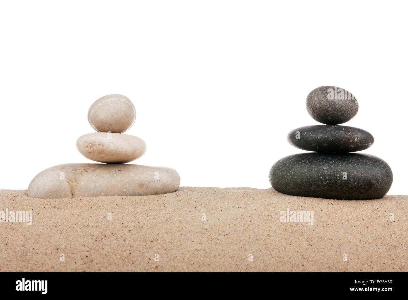 Two pyramids on the sand, isolated on white background Stock Photo - Alamy
