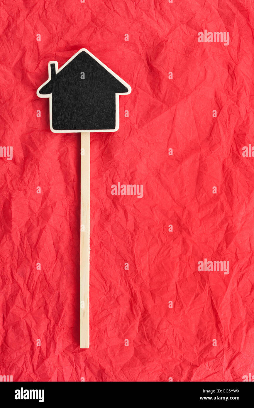 Pointer house with space for your text, lies on red background Stock ...