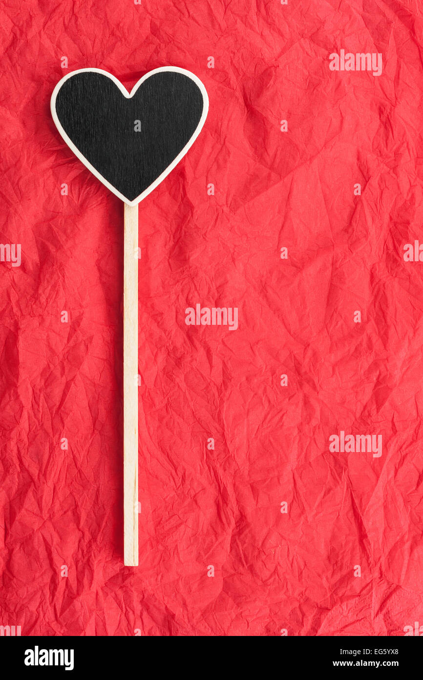 Pointer heart with space for your text, lies on red background Stock ...