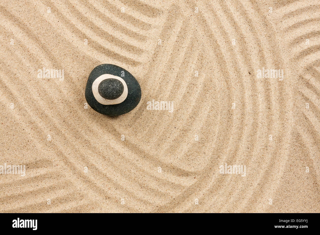 Pyramid made of stones standing on the sand, as background Stock Photo ...