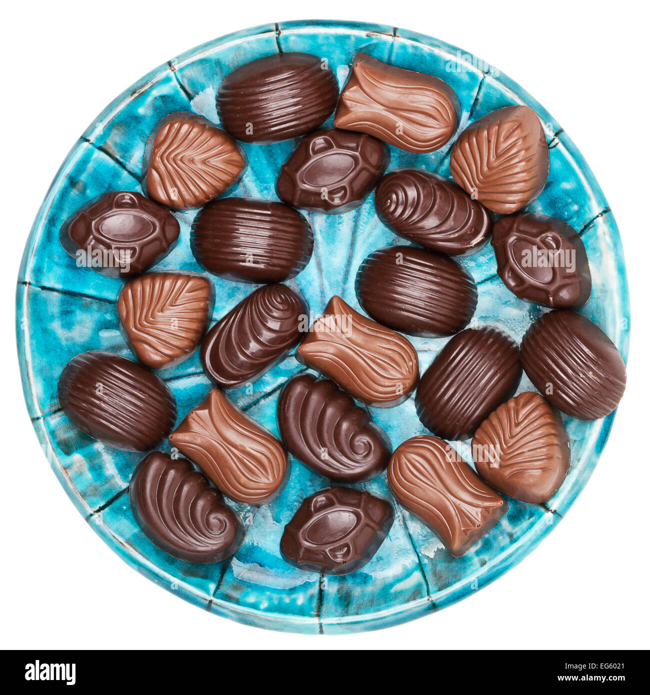 Plate of chocolates isolated on white background Stock Photo - Alamy