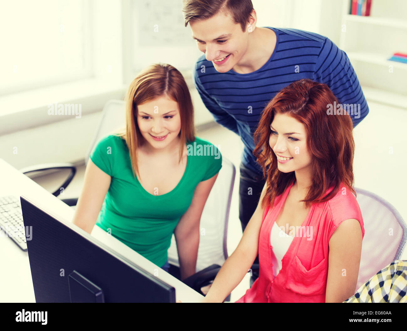 group of smiling students having discussion Stock Photo - Alamy