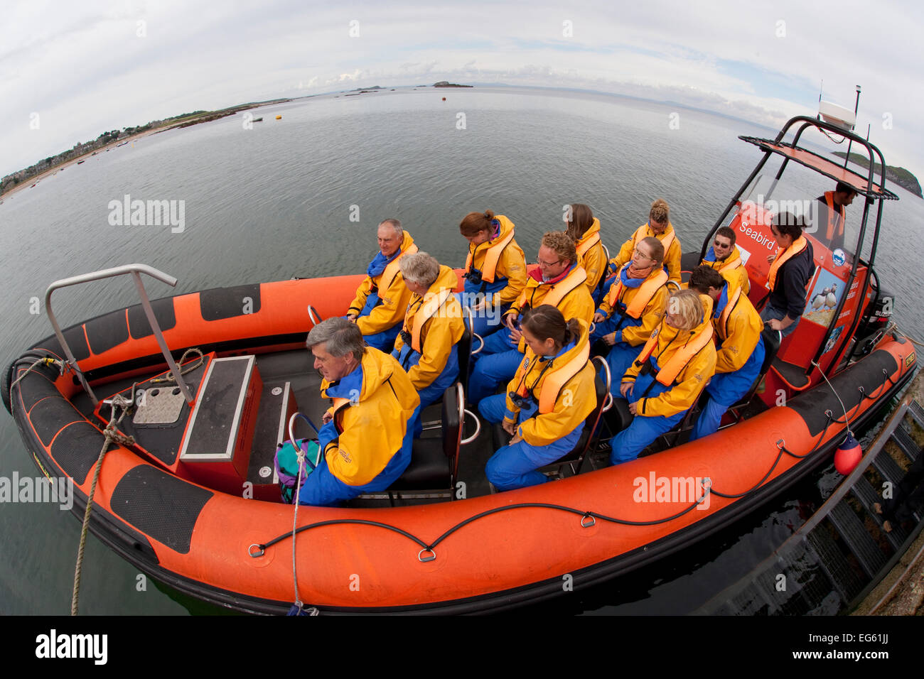 People wearing life jackets hi-res stock photography and images - Alamy