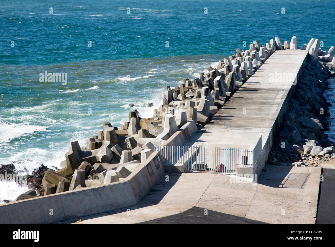 The Atlantic Ocean and harbour wall sea defences on the West Coast ...