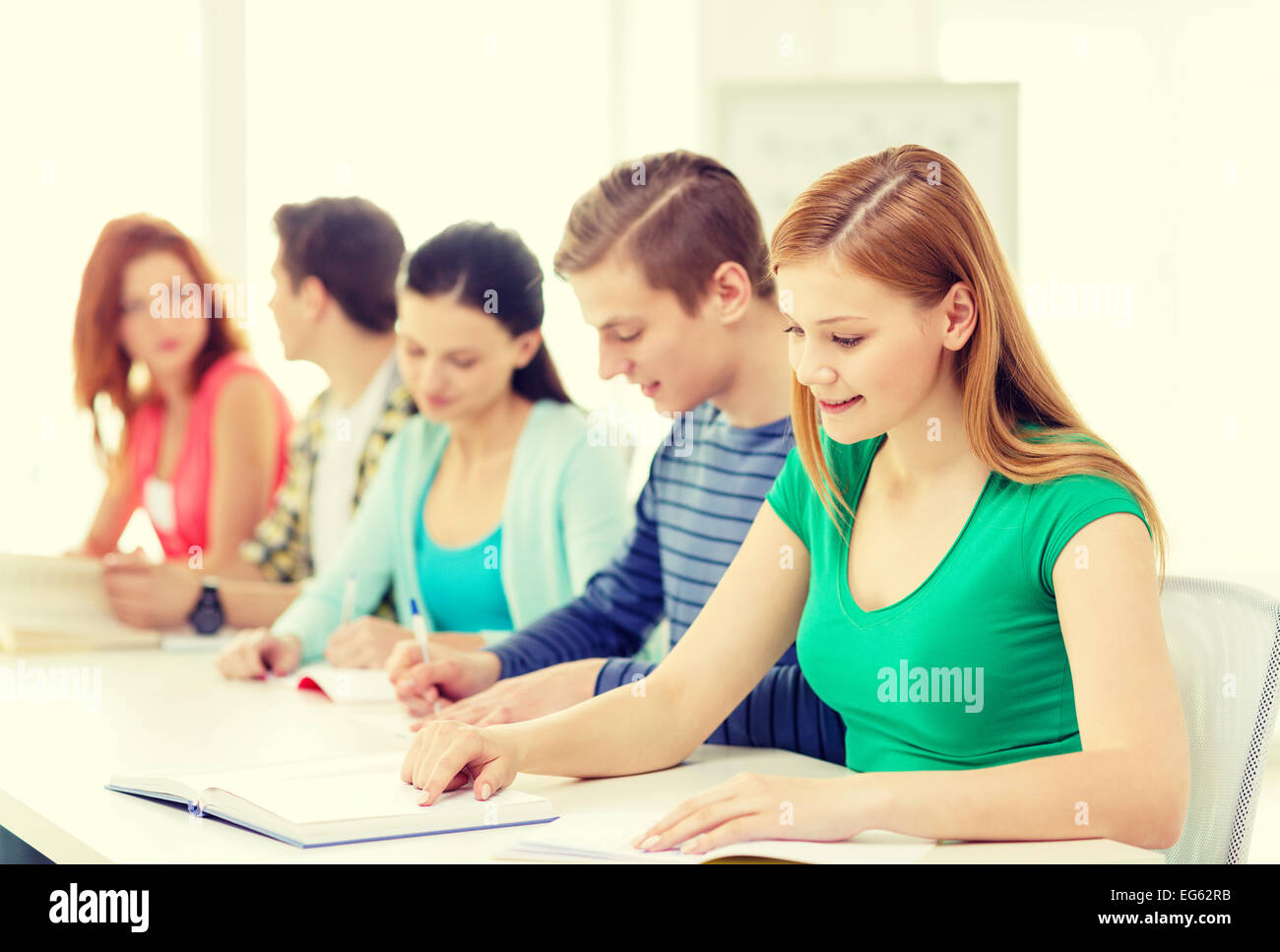 students with textbooks and books at school Stock Photo - Alamy