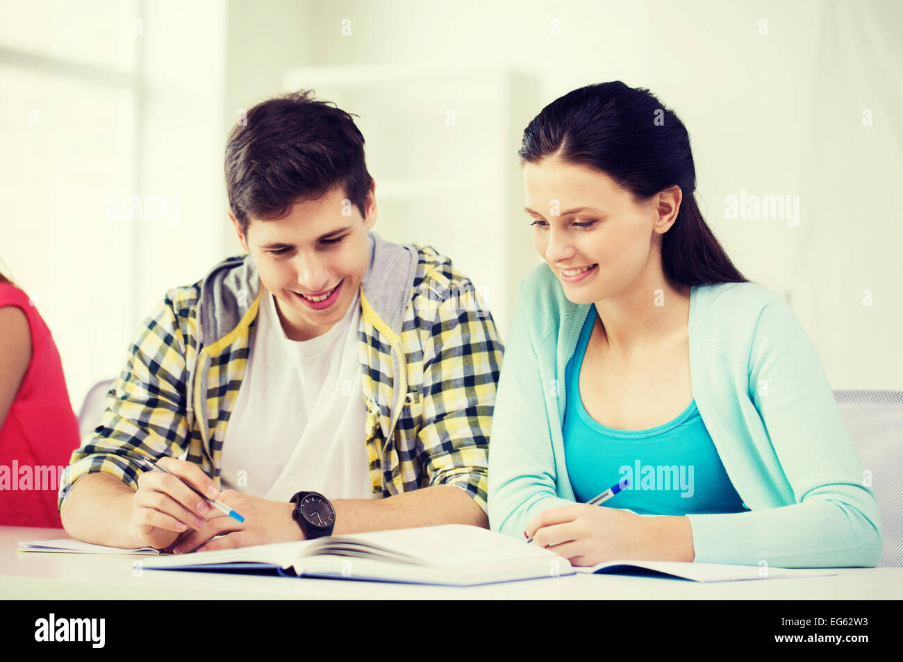 students with textbooks and books at school Stock Photo - Alamy