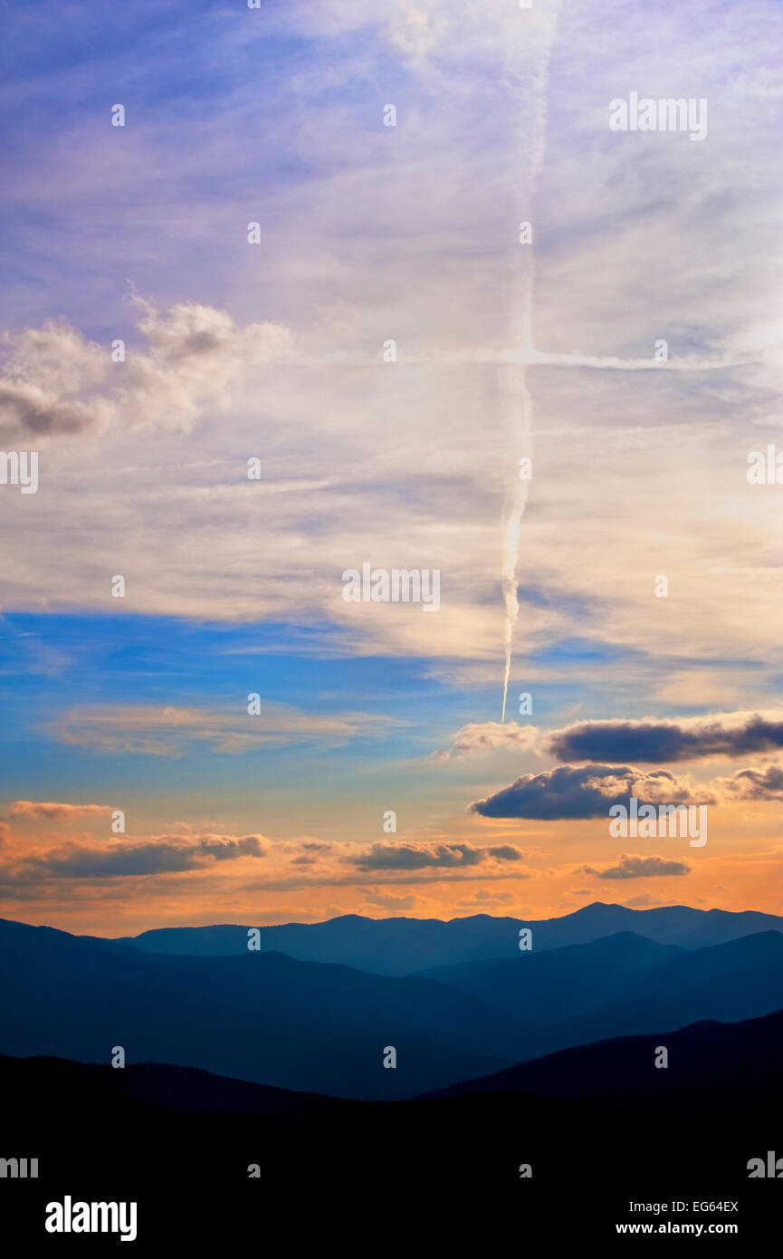 Contrails depicting a cross in the skies over the Blue Ridge Mountains ...