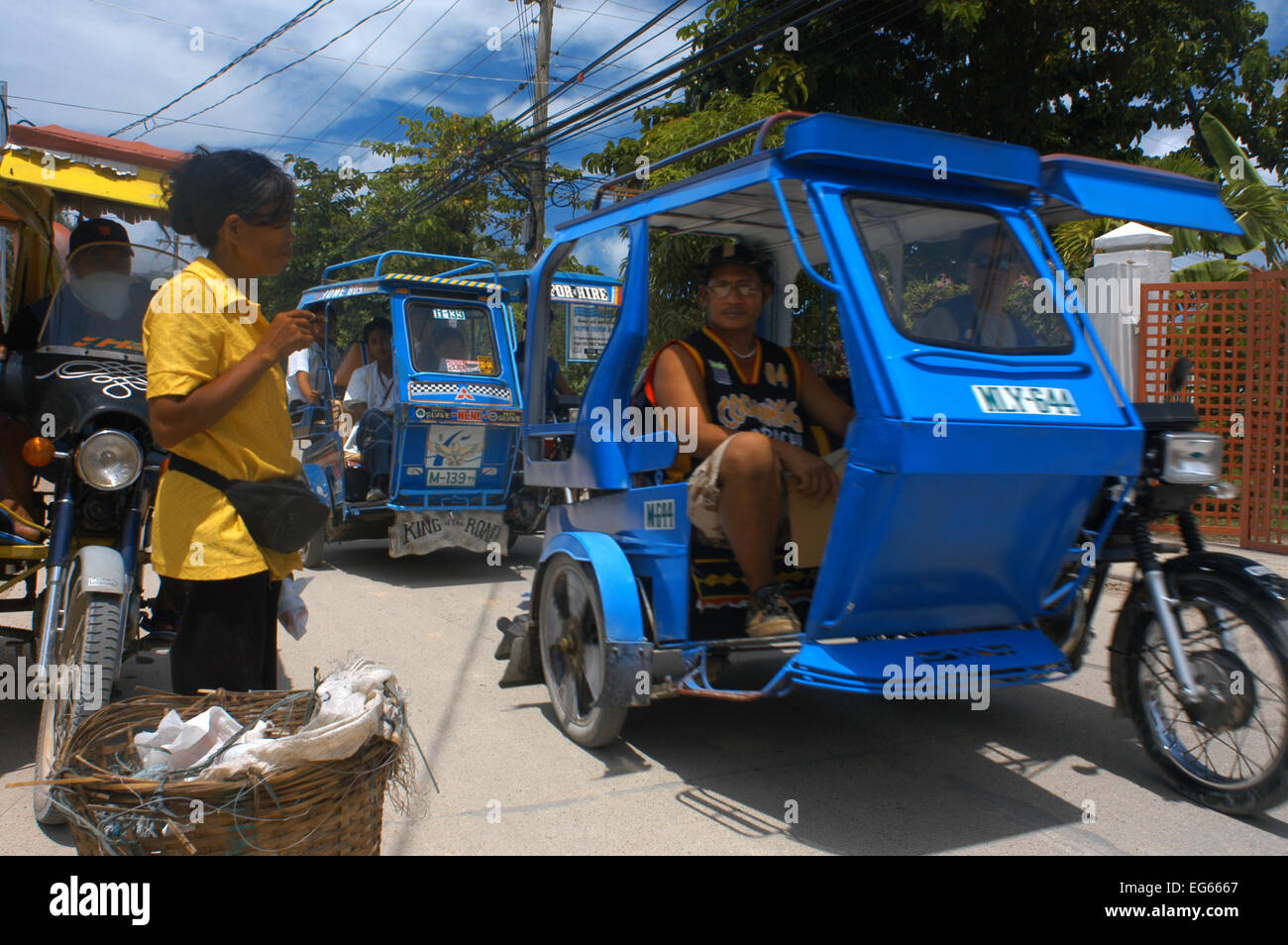 Filipino tricycles hi-res stock photography and images - Alamy