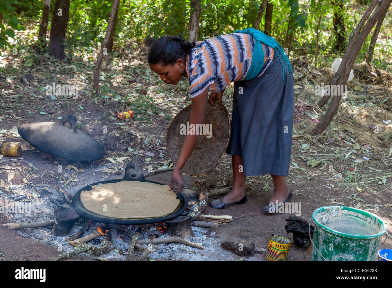 A Young Woman Making Injera (Ethiopian Flat Bread), Lalibela, Ethiopia ...