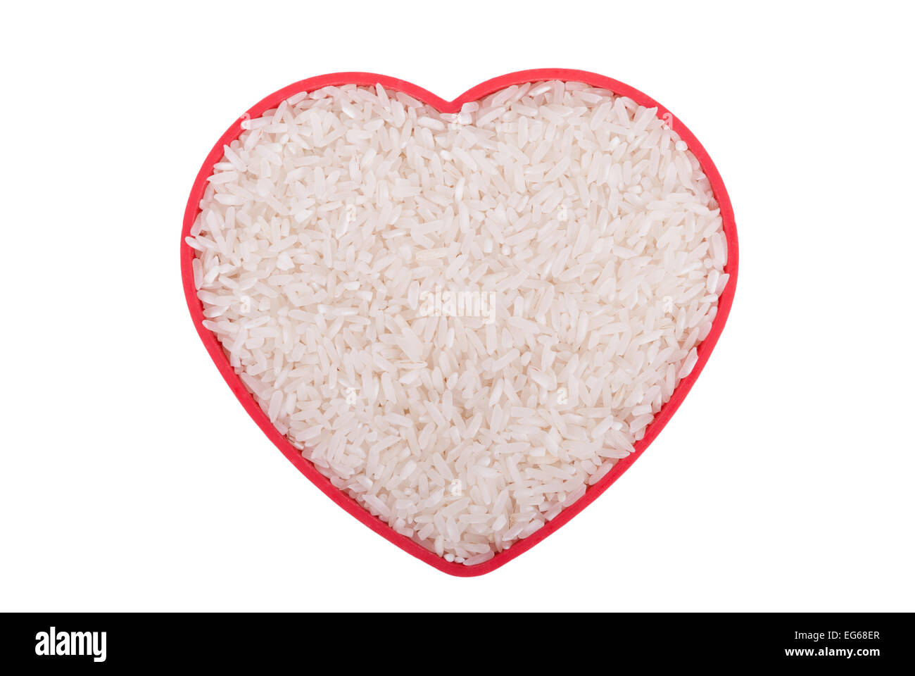 Rice in a plate in the form of heart on a white background Stock Photo ...