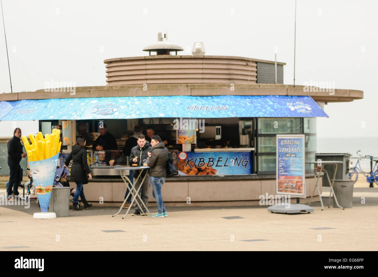 Traditional Dutch herring sandwich and fries shop Stock Photo - Alamy