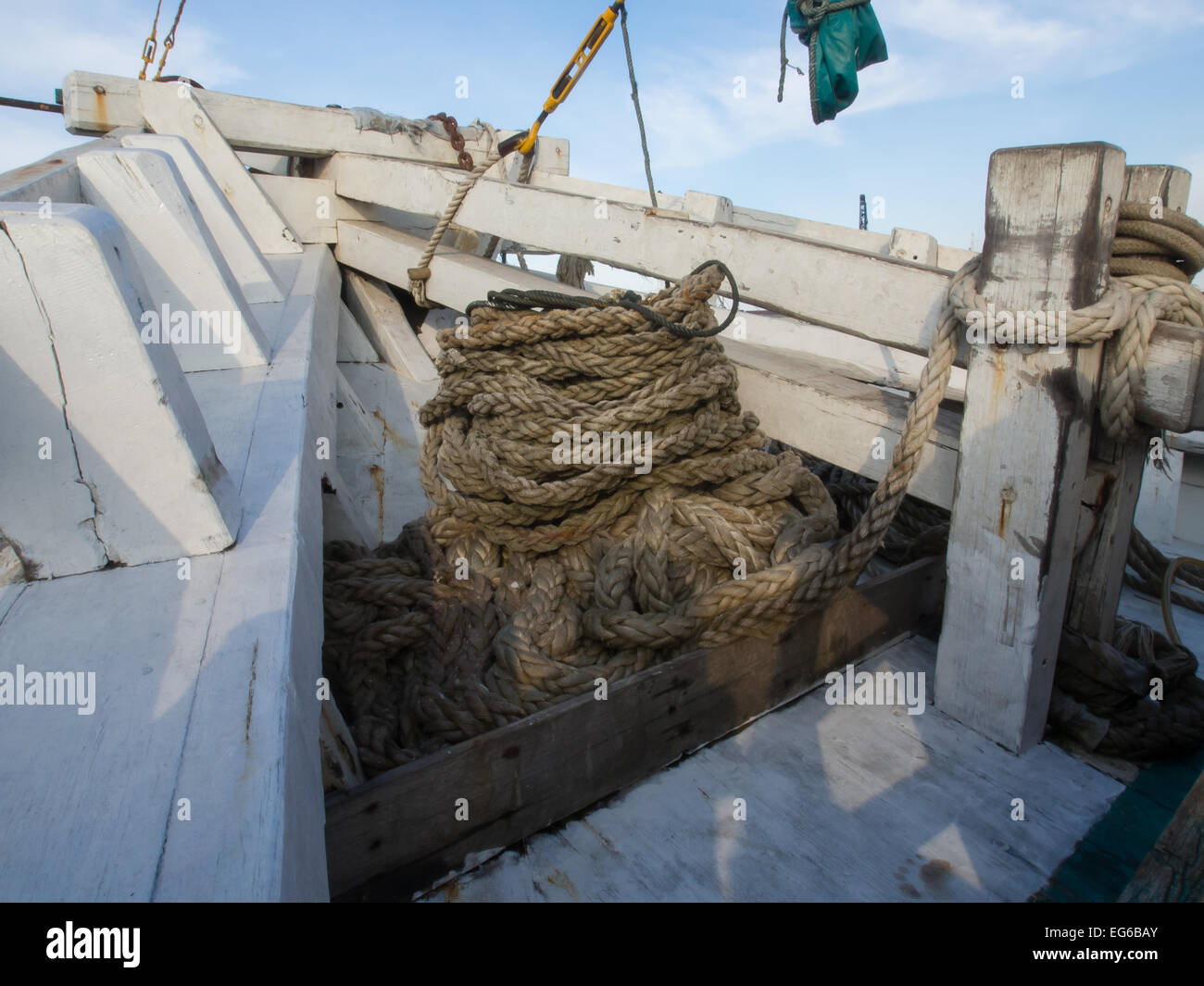 Coiled mooring line at the bow of the fishing boat. Jakarta. Indonesia ...