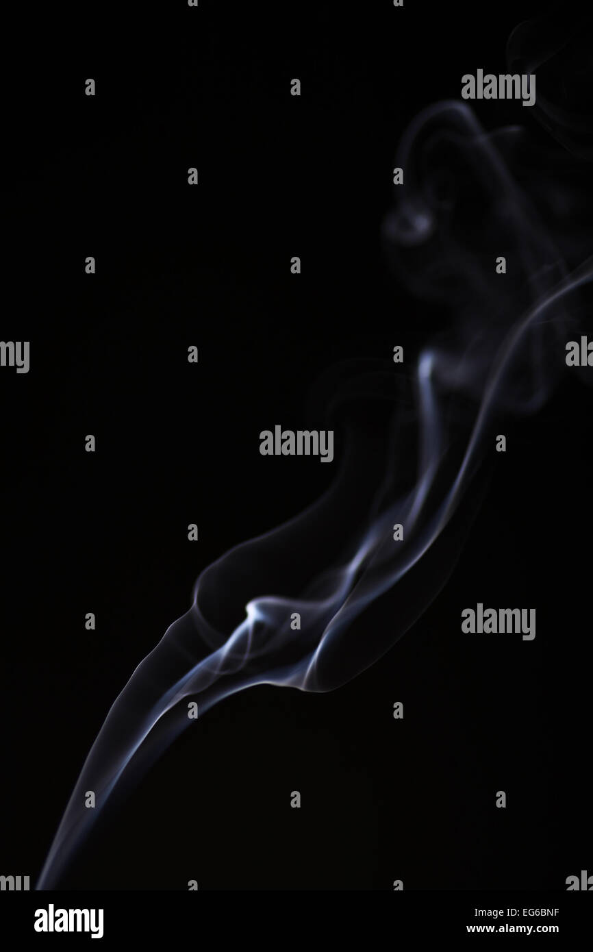 Studio shot of some smoke on a black background Stock Photo - Alamy