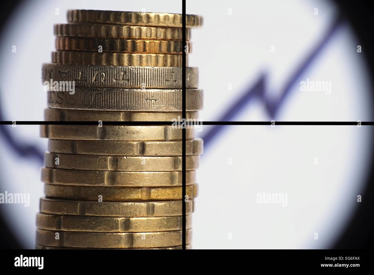 Stack of coins with a rising chart in the background, aimed by a sniper ...