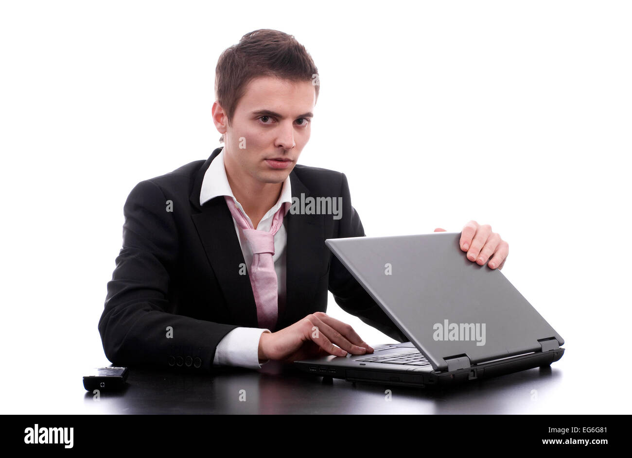 Young businessman working, isolated over white background Stock Photo ...