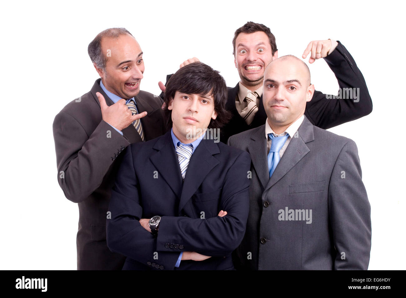 business team posing - rear men joking, isolated over white Stock Photo ...