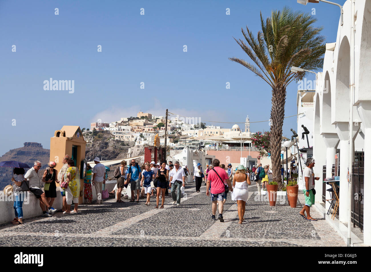 Santorini Fira. Tourist walking on the center of town Stock Photo - Alamy