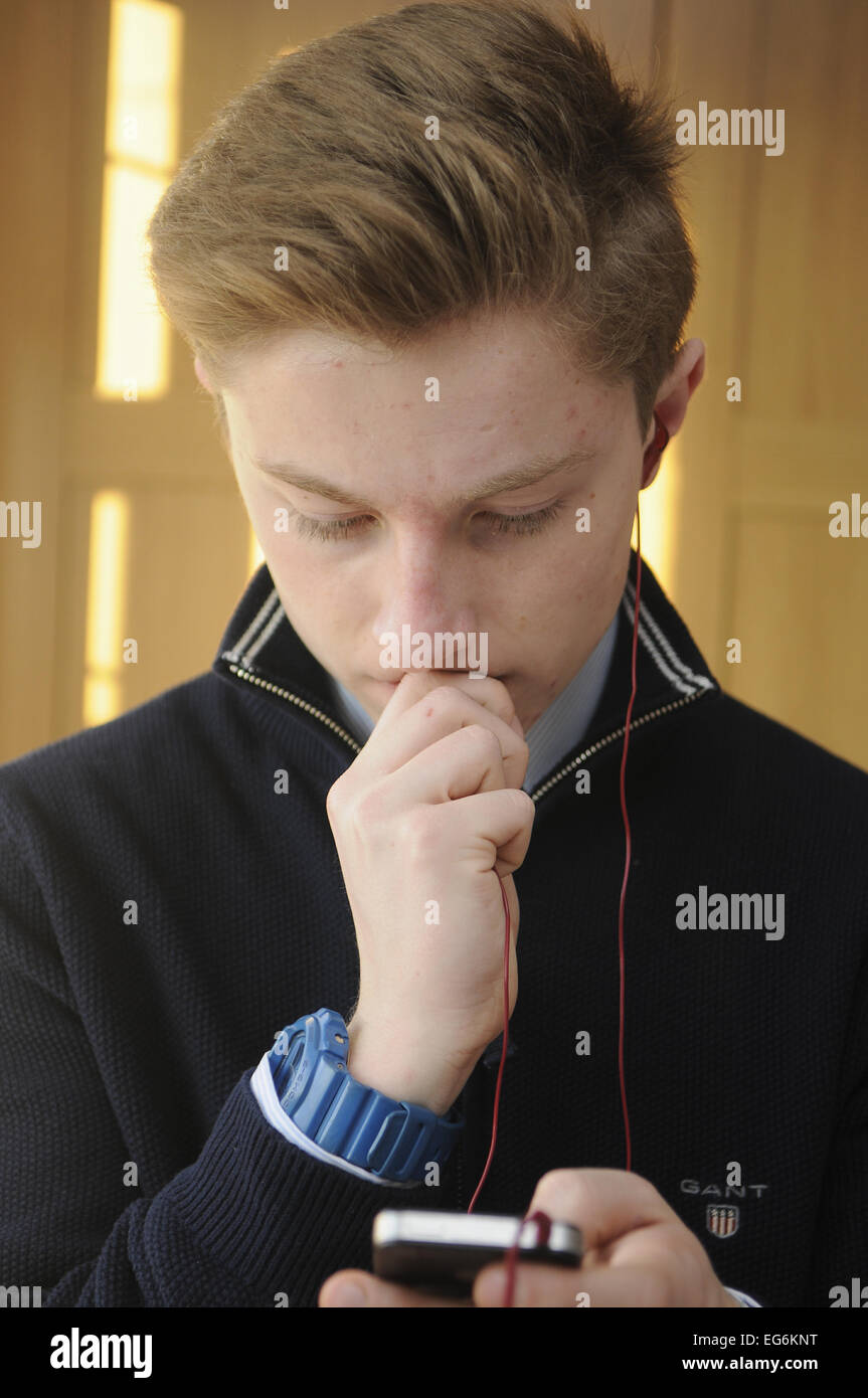 Teenage Boy Using An Apple iPhone Stock Photo - Alamy