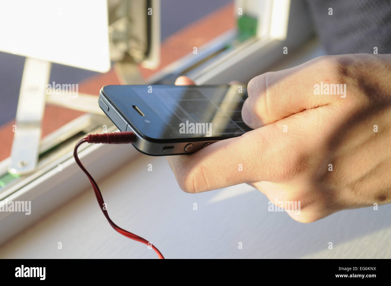 Teenage Boy Using An Apple iPhone 4 Stock Photo - Alamy