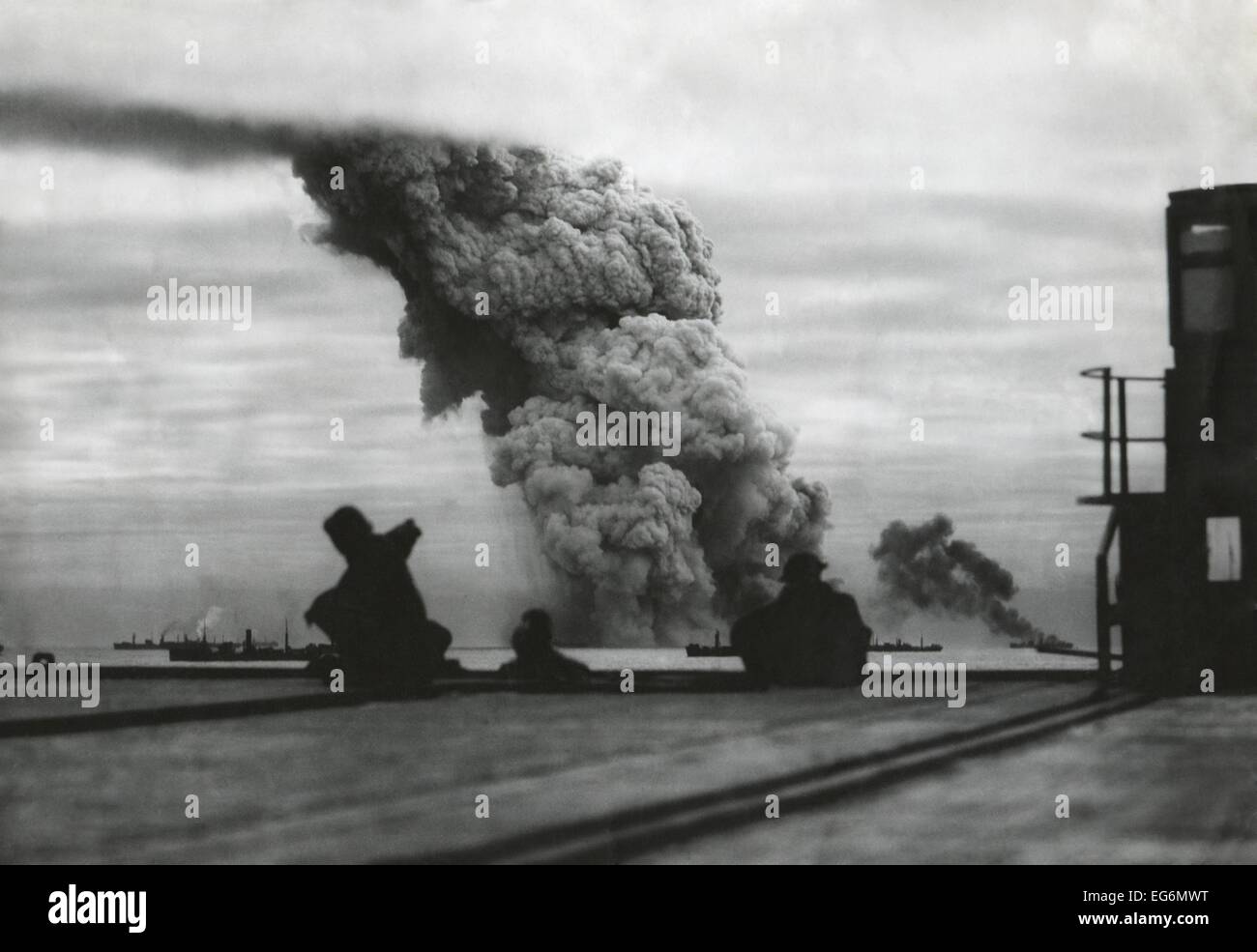Smoke from a merchant ship bombed in an Allied convoy to the Soviet ...