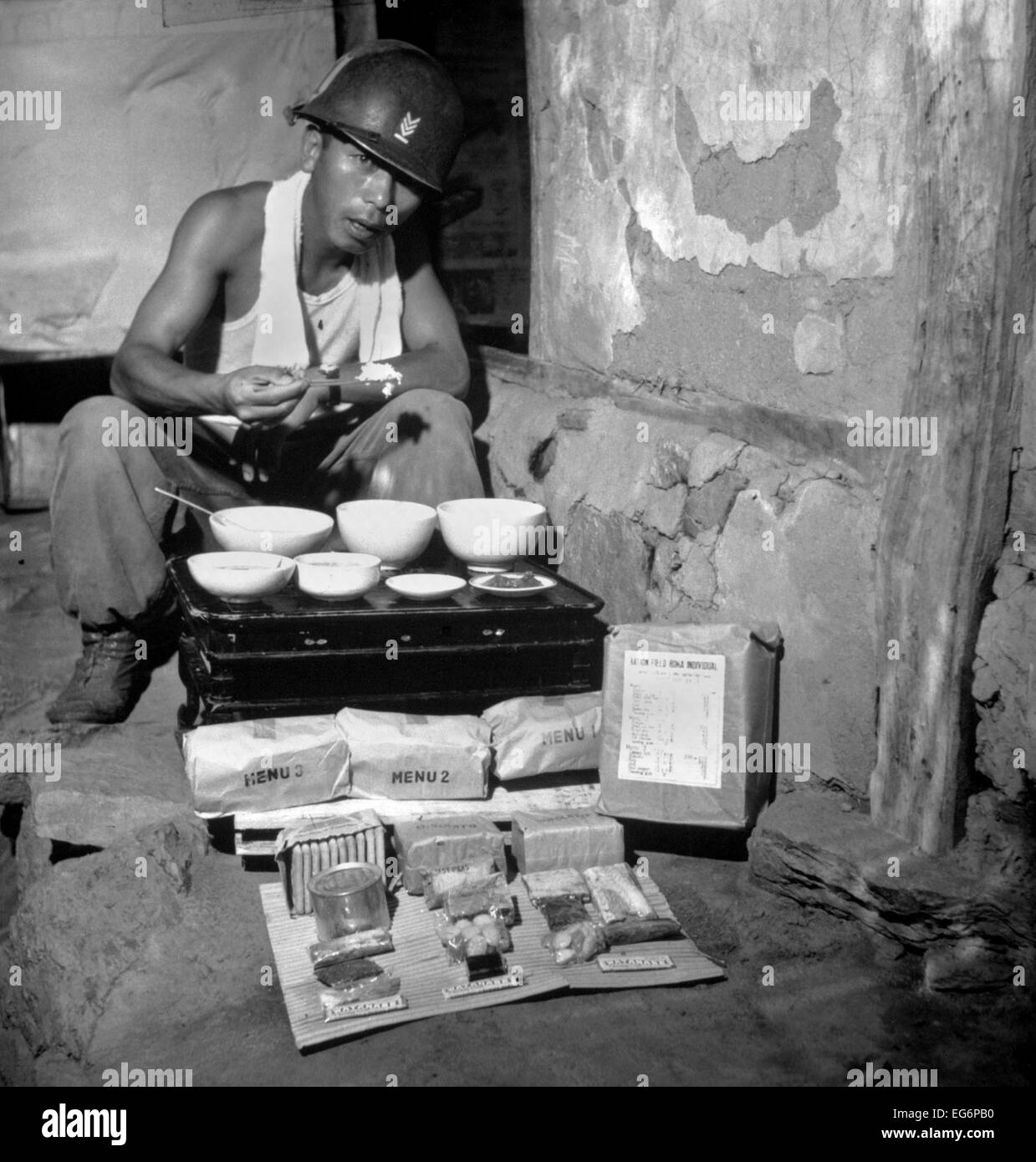 South Korean lays out the ROKA (Republic of Korea Army) field ration ...